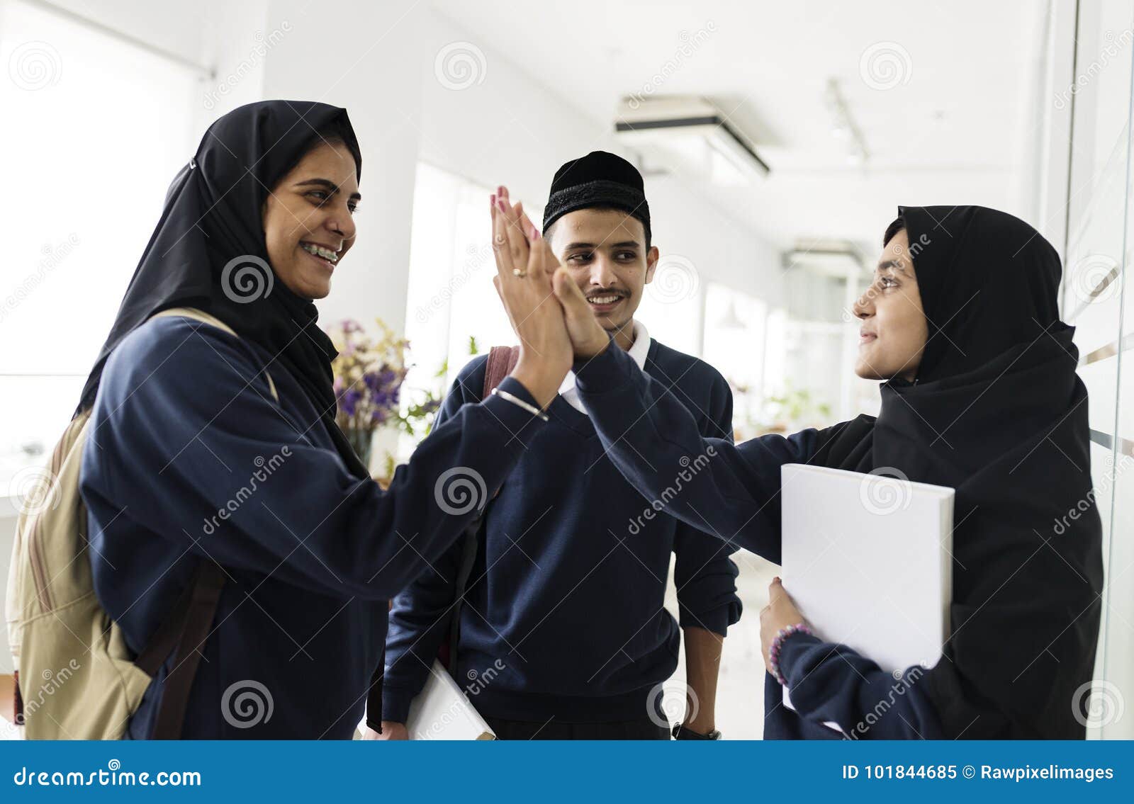 A Group of Muslim Students Doing Hi-5 Stock Image - Image of students ...