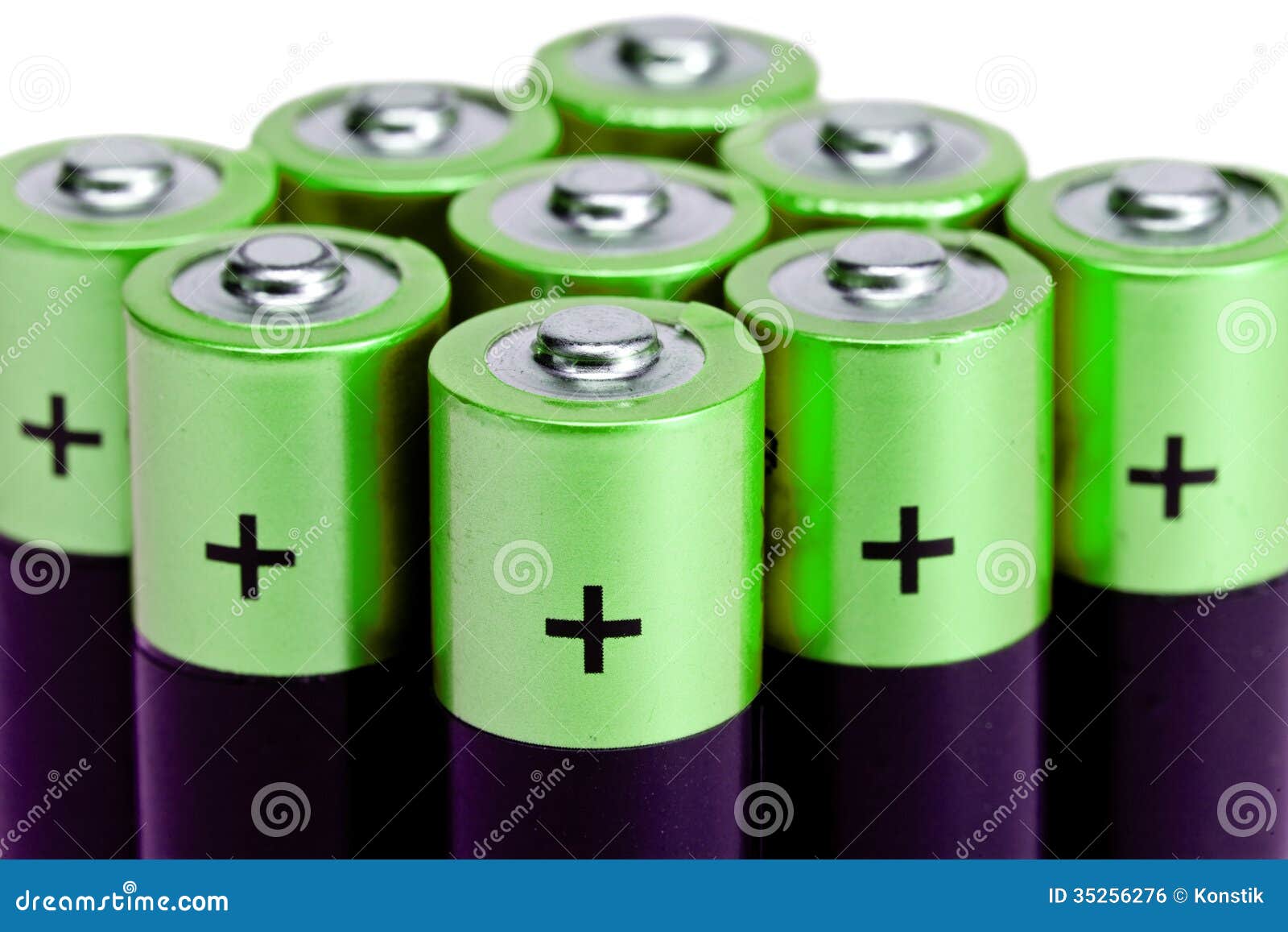 Group of Nine Green Finger-type Batteries of the AA Size on a White ...