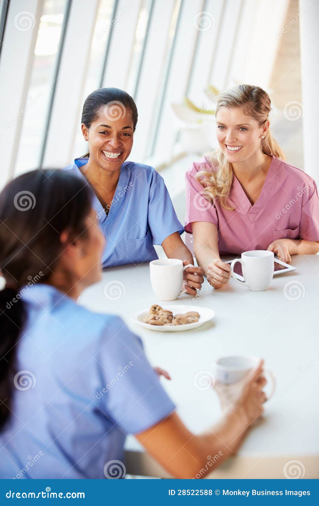 Group of Nurses Chatting in Modern Hospital Canteen Stock Photo - Image ...