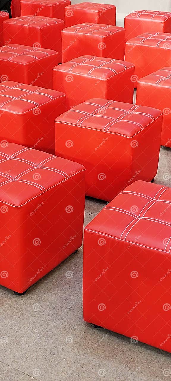 Group of Object Backless Chair Covered in Red Leather Decorated with ...