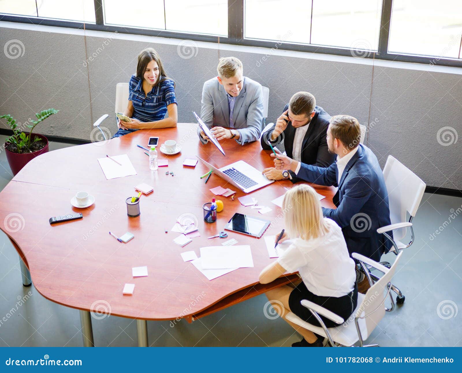 A Group of Office Workers Work at the Desk in the Office Stock Photo ...