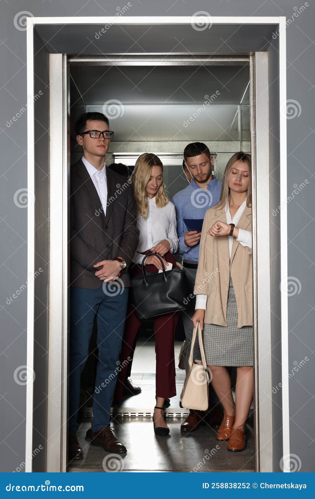 Group of Office Workers in Modern Elevator Stock Photo - Image of ...