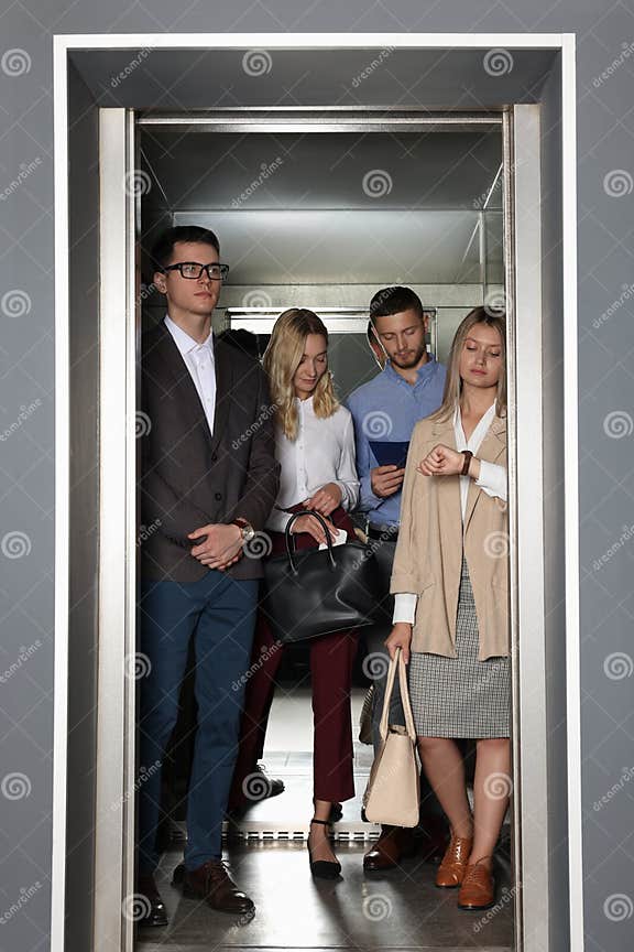 Group of Office Workers in Modern Elevator Stock Photo - Image of ...