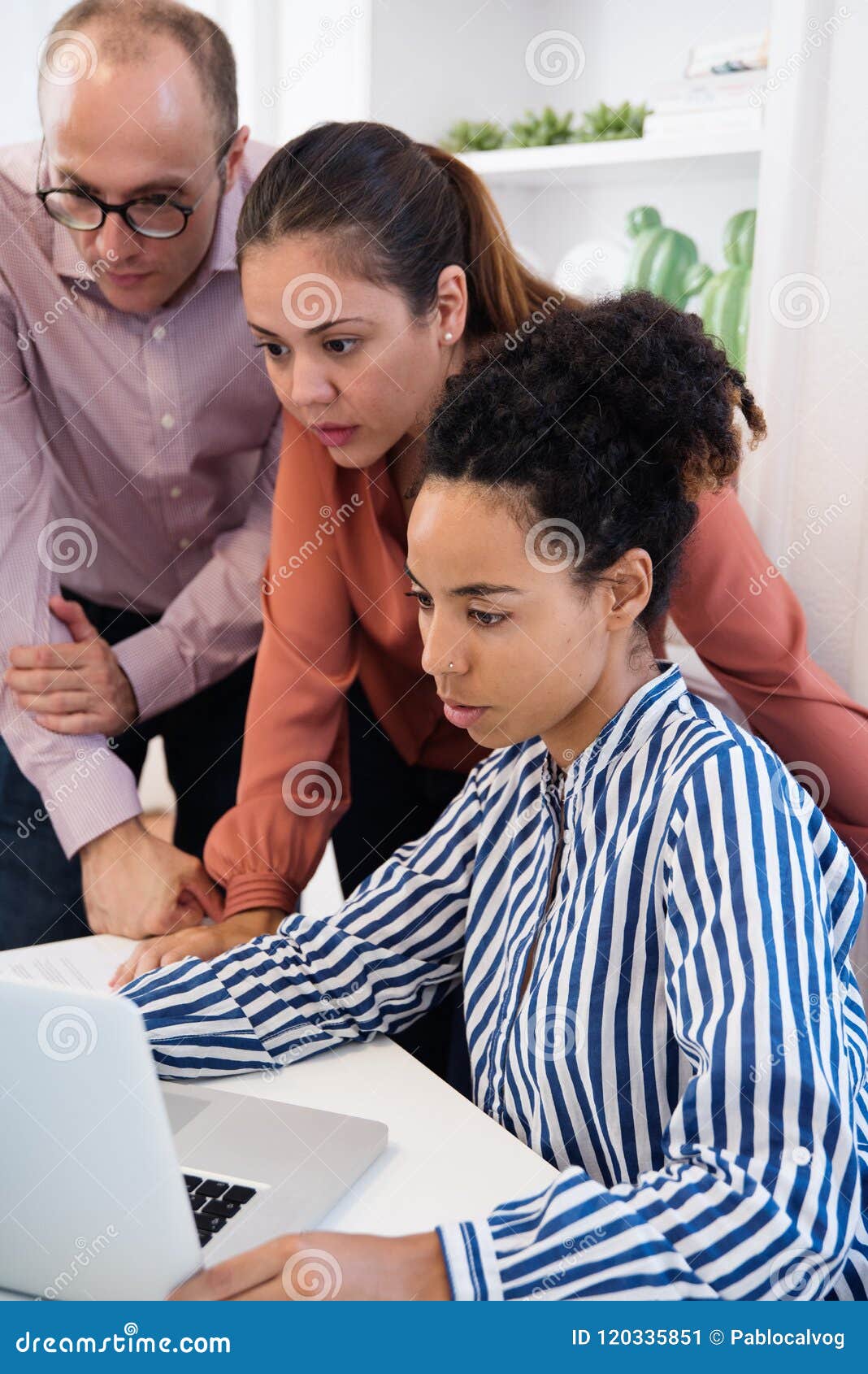 Group of Office Workers Looking at a Computer Stock Image - Image of ...