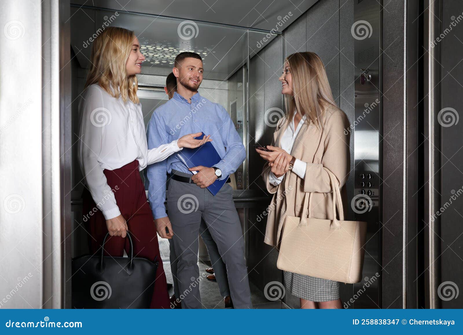 Group of Office Workers Talking in Modern Elevator Stock Image - Image of business, inside ...