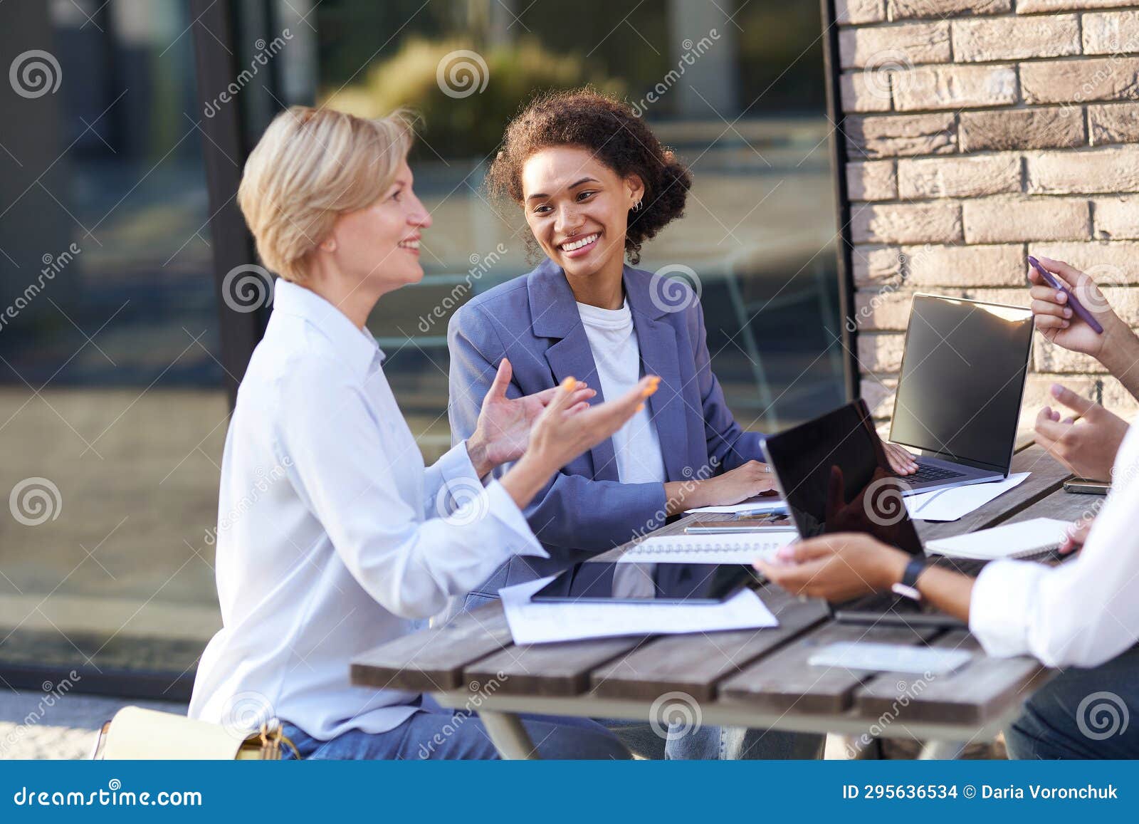 Group of Office Workers Working on the Terrace of the Office. Teamwork ...