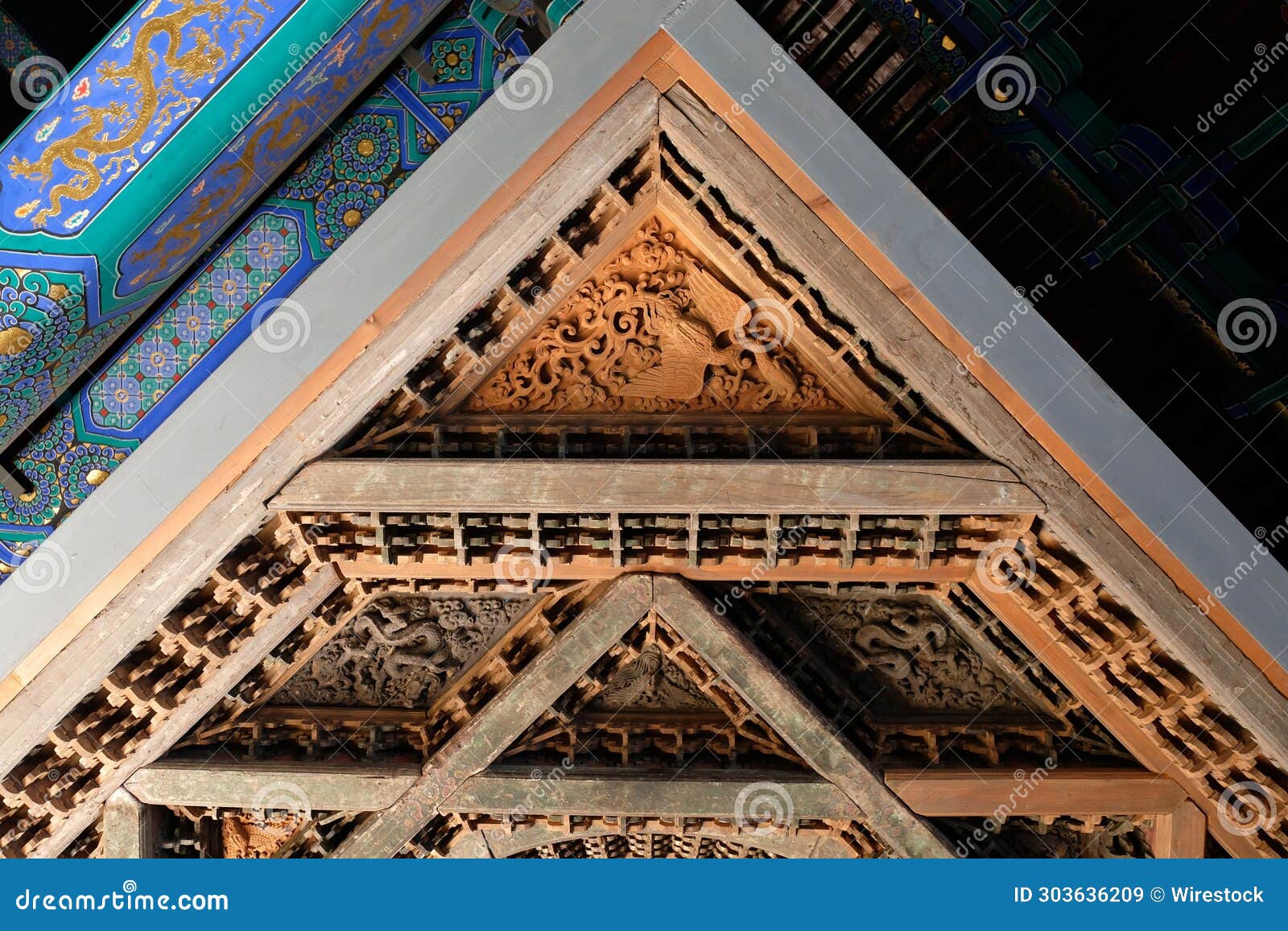 A Group of Ornately Decorated Columns in the Shape of a Pyramid ...