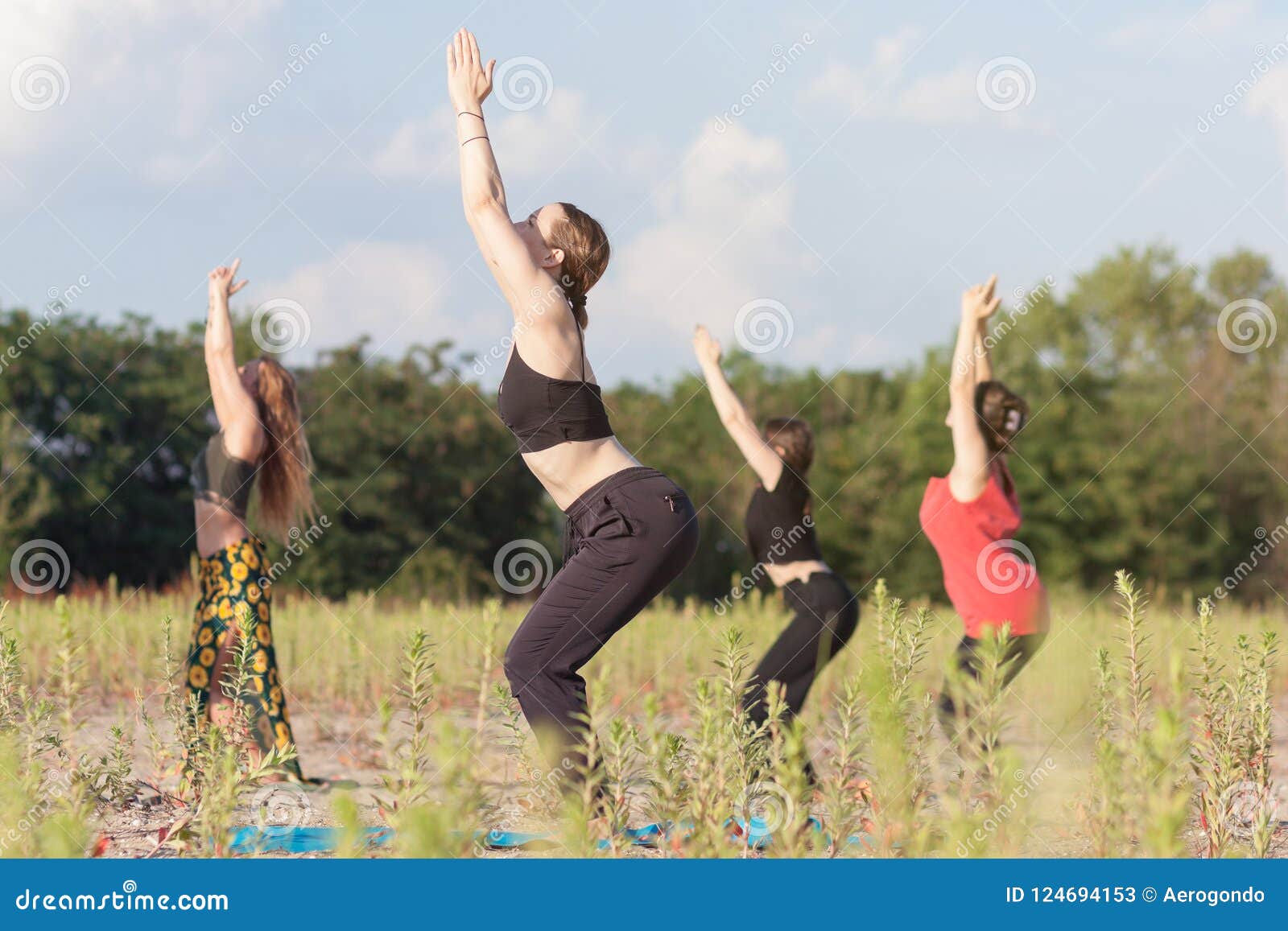 Yoga class outdoors stock image. Image of lifestyle - 124694153