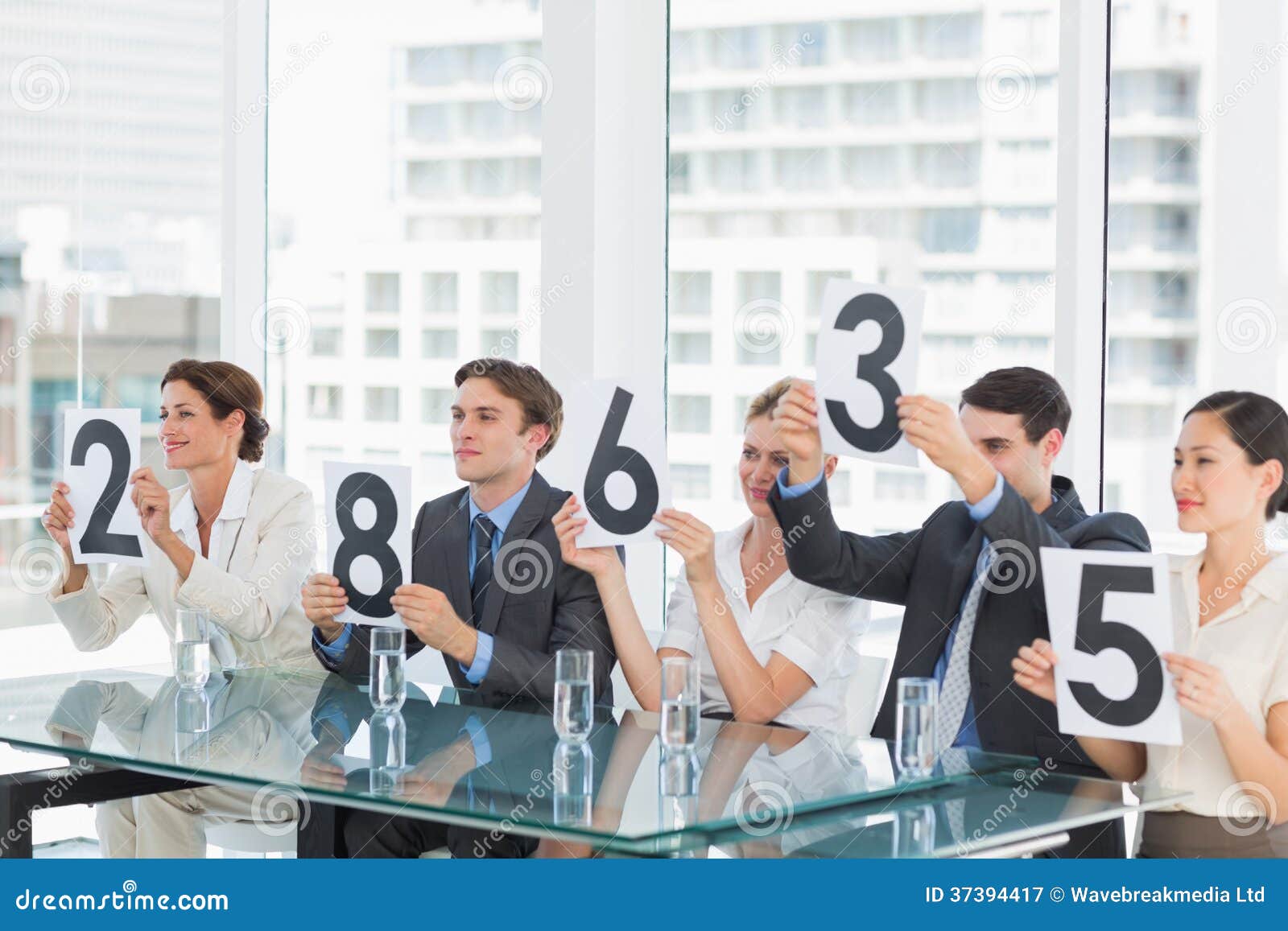 Group of Panel Judges Holding Score Signs Stock Image - Image of ...