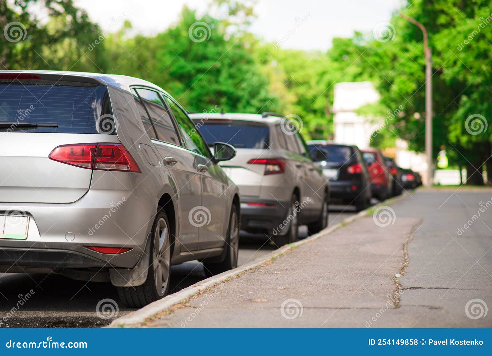 A Group of Parked Cars Along the Road. Back View. Stock Photo - Image ...