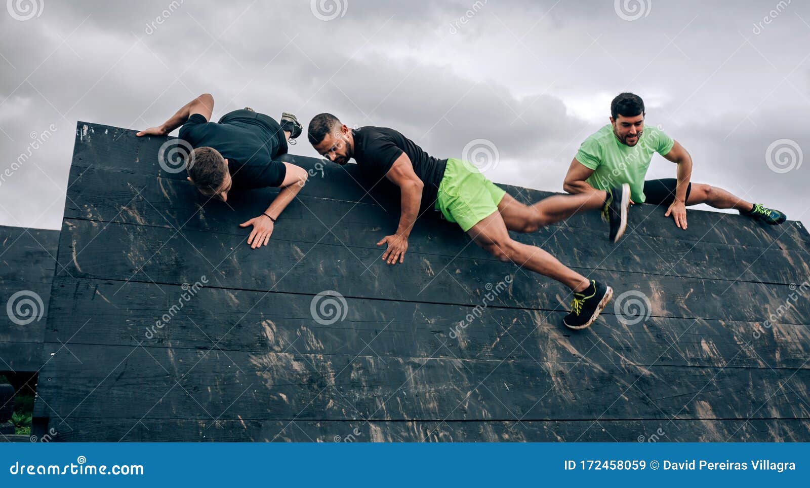 Participants in Obstacle Course Climbing Wall Stock Image - Image of ...