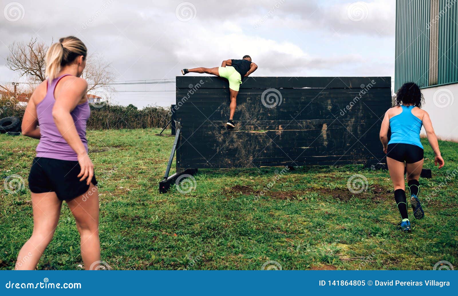 Participants in Obstacle Course Climbing Wall Stock Image - Image of ...