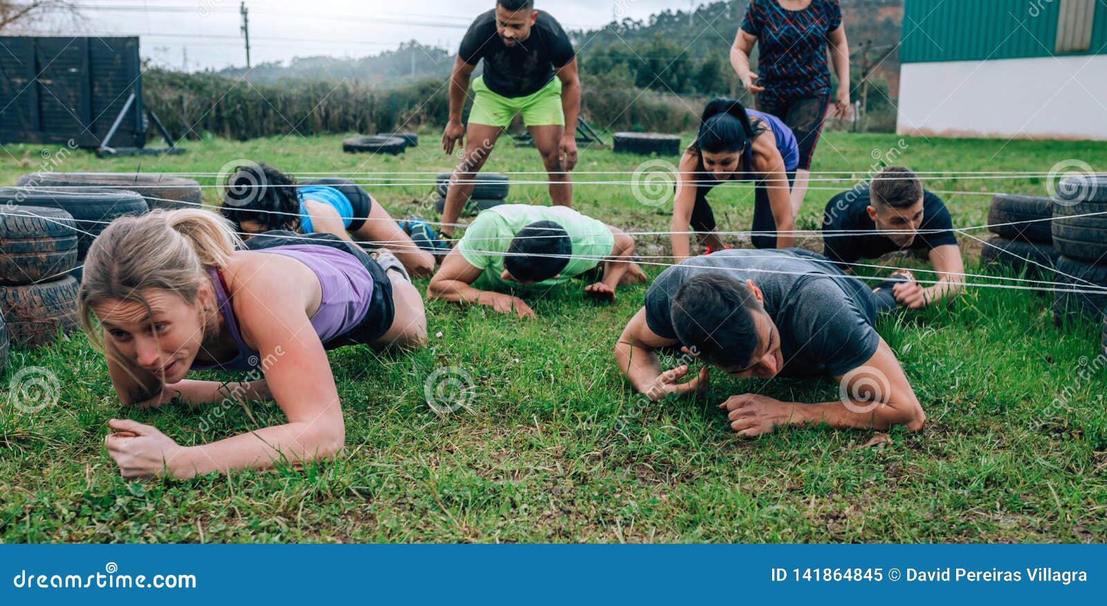 Participants in an Obstacle Course Crawling Stock Image - Image of ...