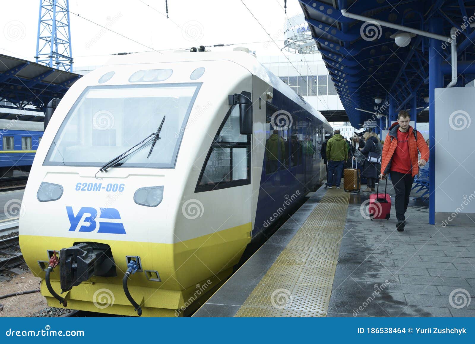 Group of Passengers Standing in Front of Doors of the Passenger Train ...