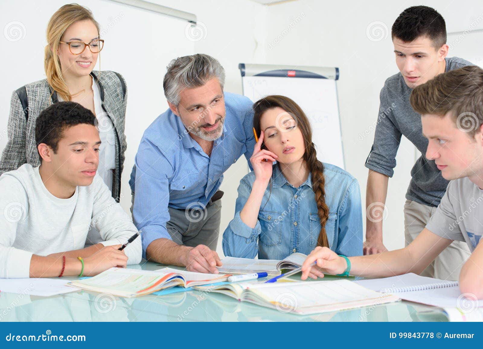 Group people around table stock photo. Image of female - 99843778
