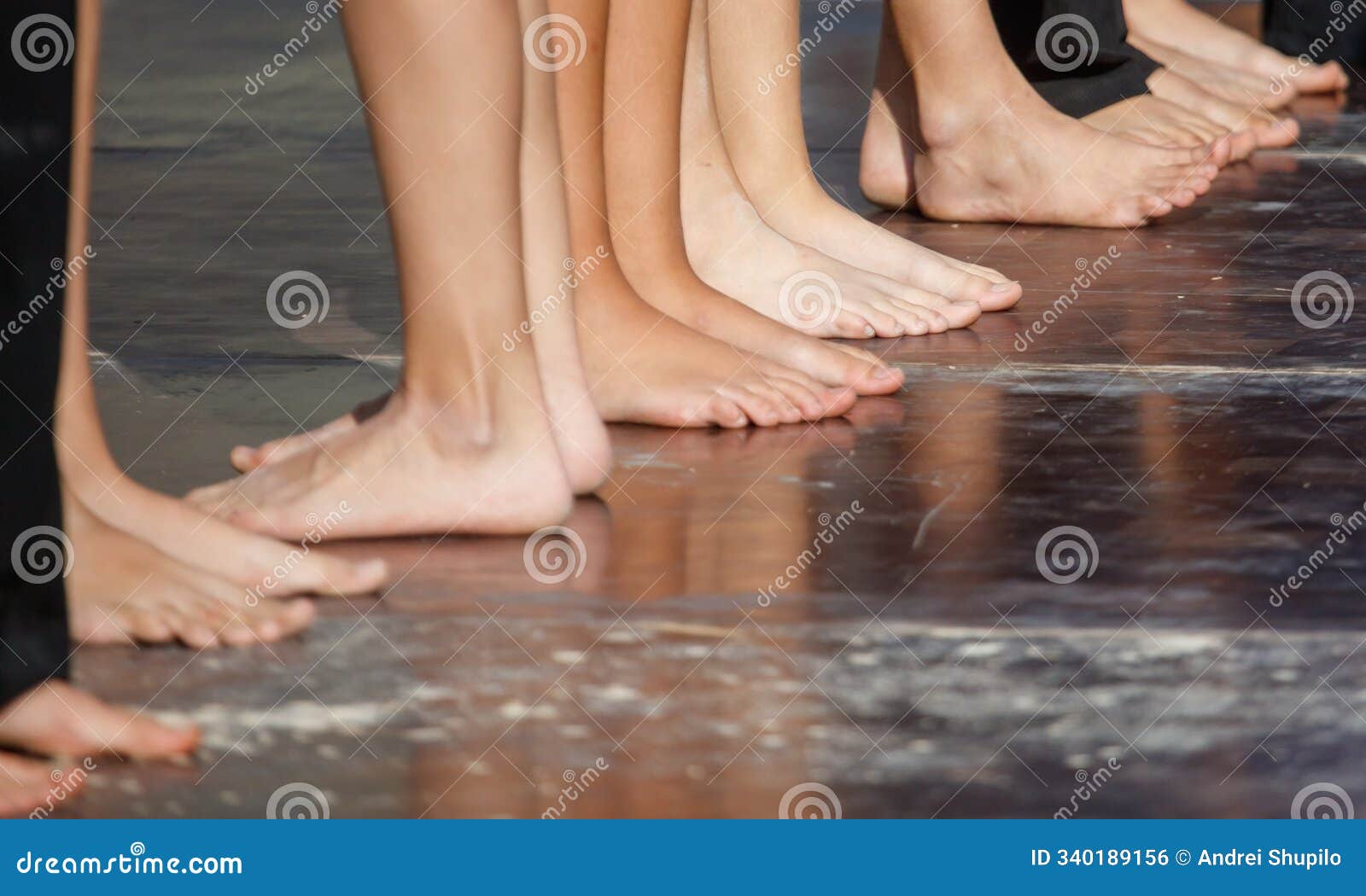A Group of People are Barefoot on a Stage Stock Photo - Image of adult, lifestyle: 340189156