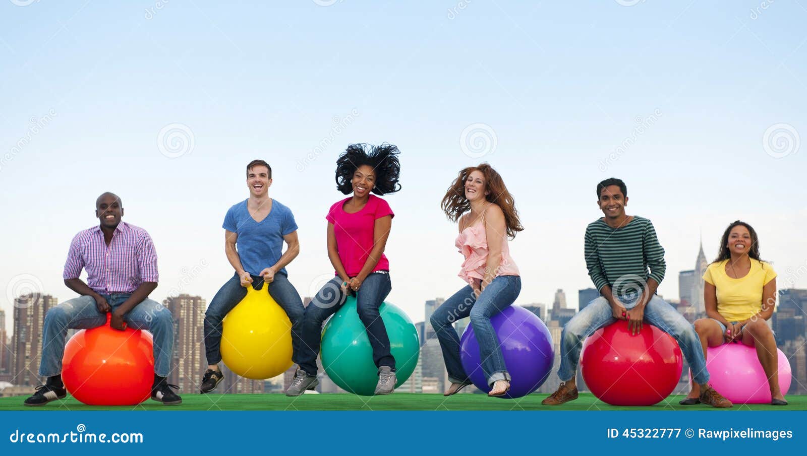 Group of People Bouncing Balls Skyline Stock Image - Image of ethnic ...