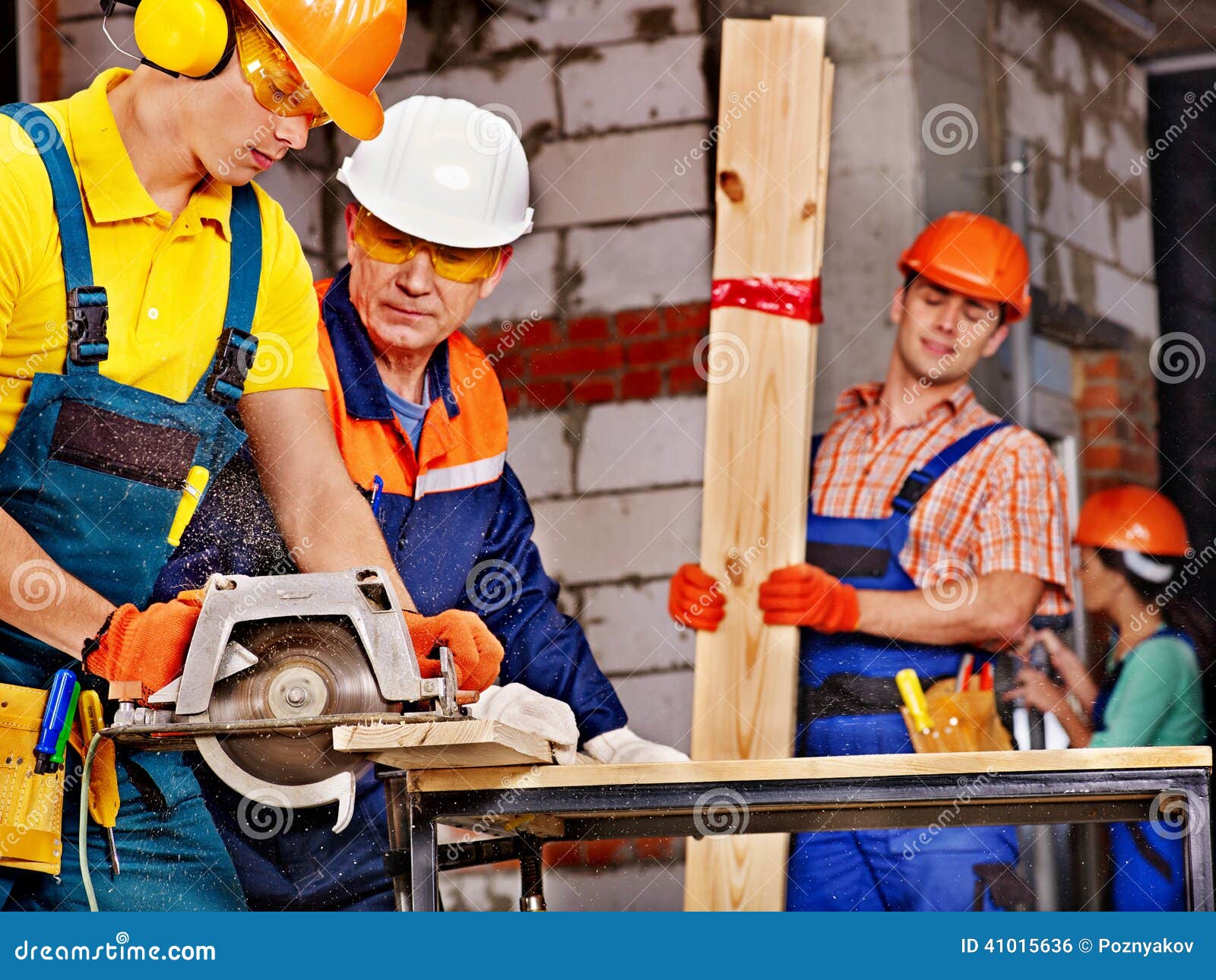 Group People Builder with Circular Saw . Stock Photo - Image of ...