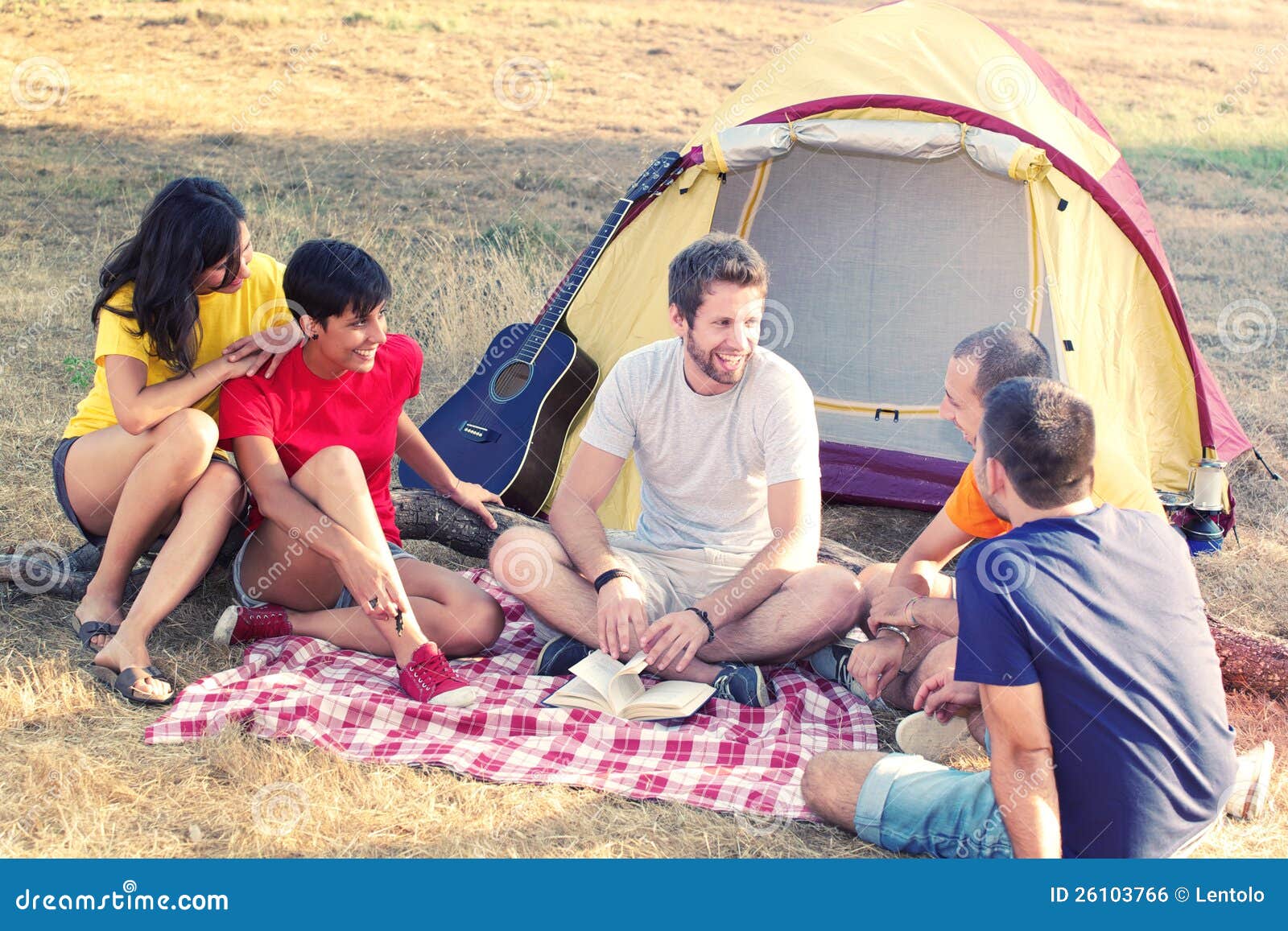 Group of People Camping and Telling a Story Stock Photo - Image of male ...