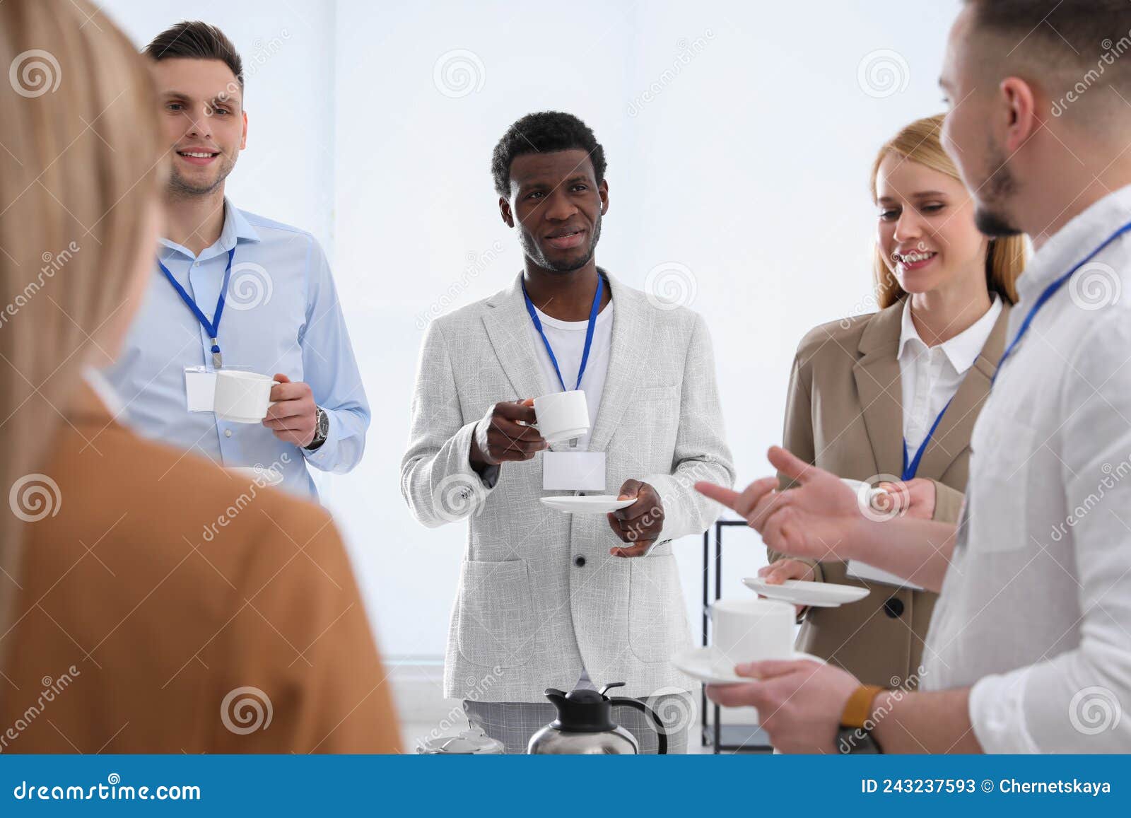 Group of People Chatting during Coffee Break Indoors Stock Image ...