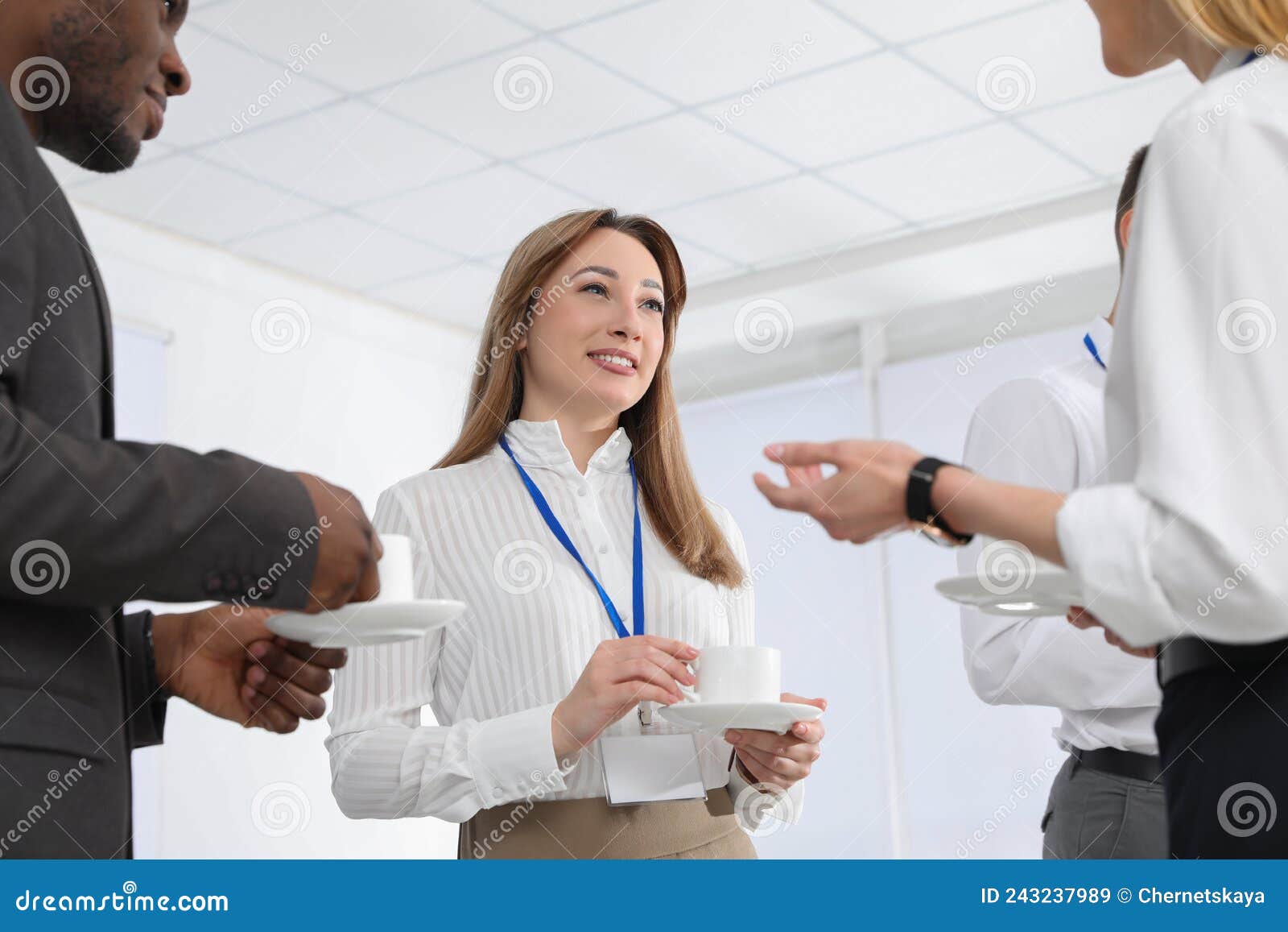 Group of People Chatting during Coffee Break Indoors Stock Image ...