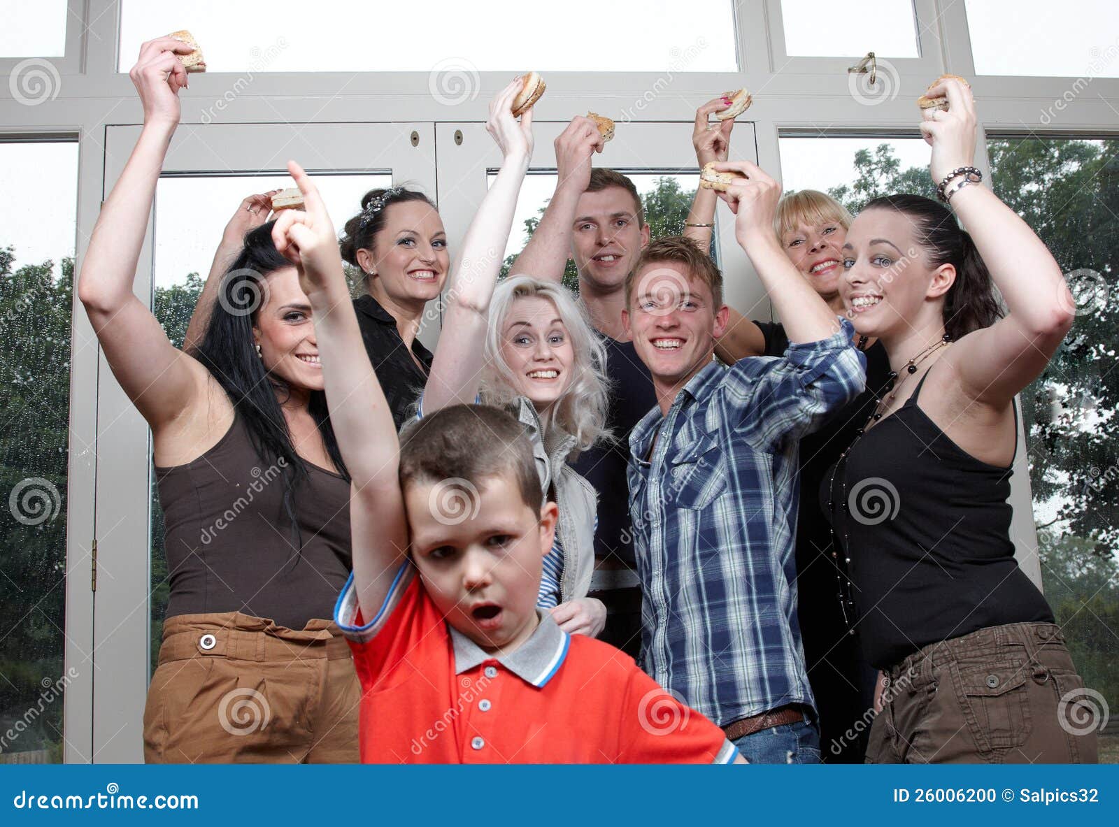 A group of people cheering stock photo. Image of bread - 26006200