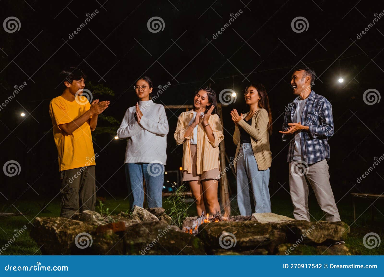 A Group of People Clap Their Hands while Standing in Circle Stock Photo ...