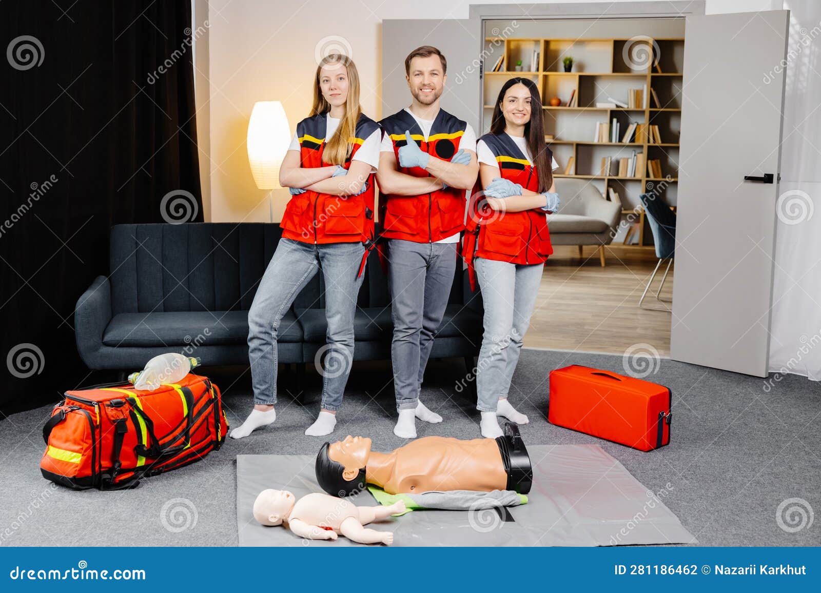 Group of People with Cpr Dummy Looking at Camera and Smiling after ...