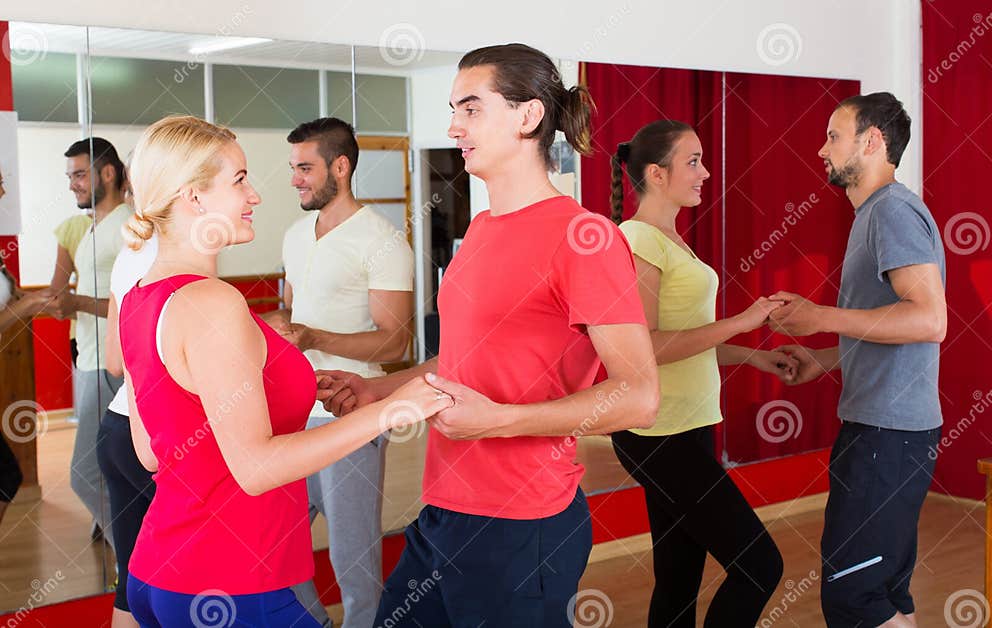 Group of People Dancing Salsa in Studio Stock Photo - Image of ...