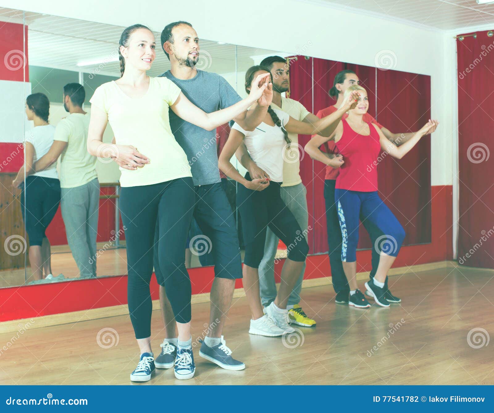 Group of People Dancing Salsa in Studio Stock Photo - Image of active ...