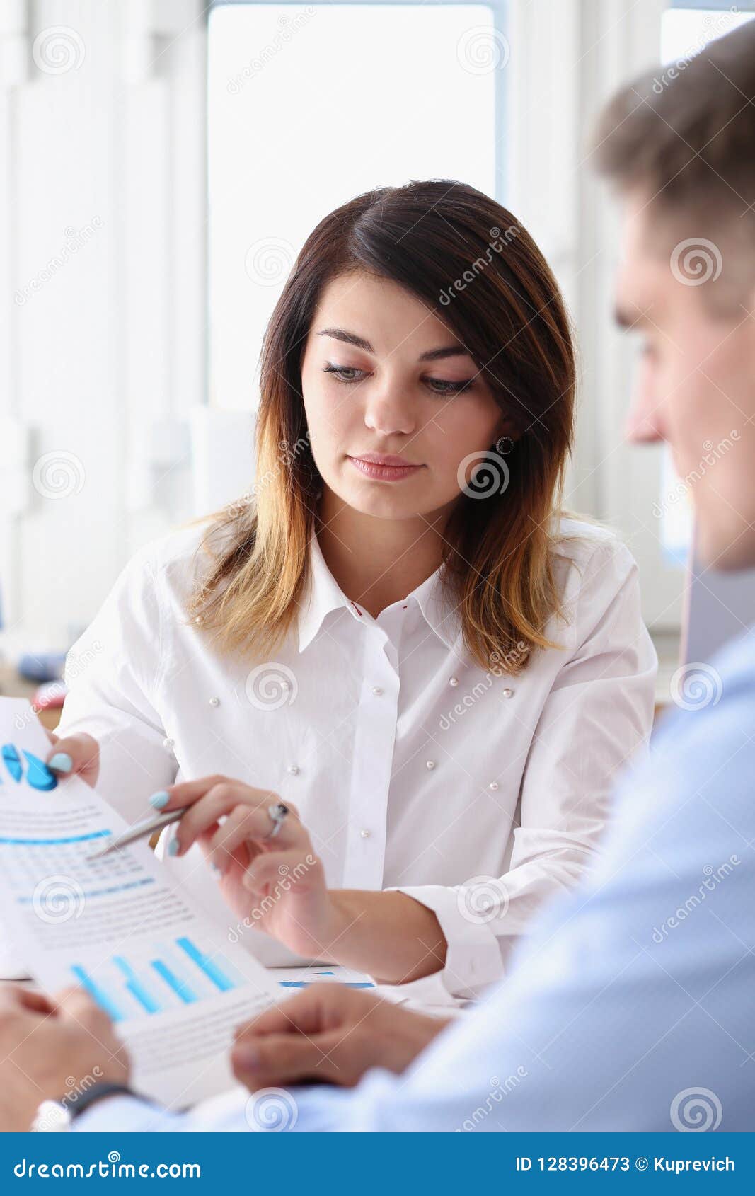 Group of People Deliberate on Problem with Paper Stock Image - Image of ...