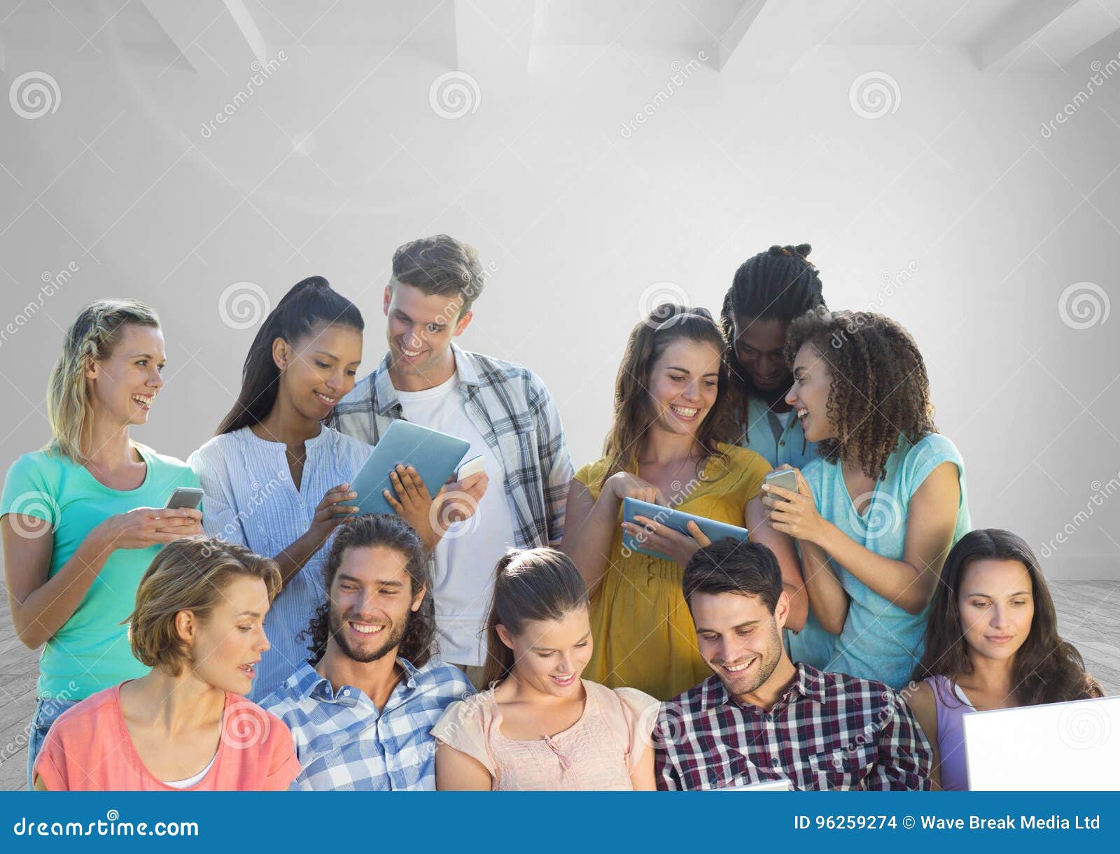 Group of People on Devices in Front of Room Stock Photo - Image of ...