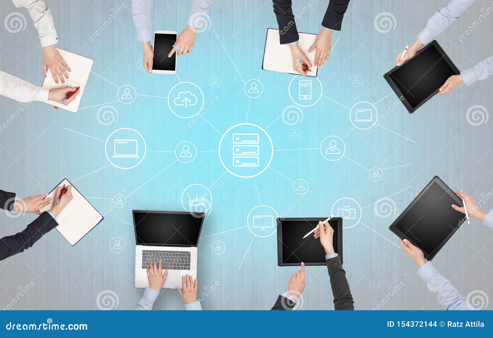 Group of People with Devices in Hands Working on Laptops and Tablets ...