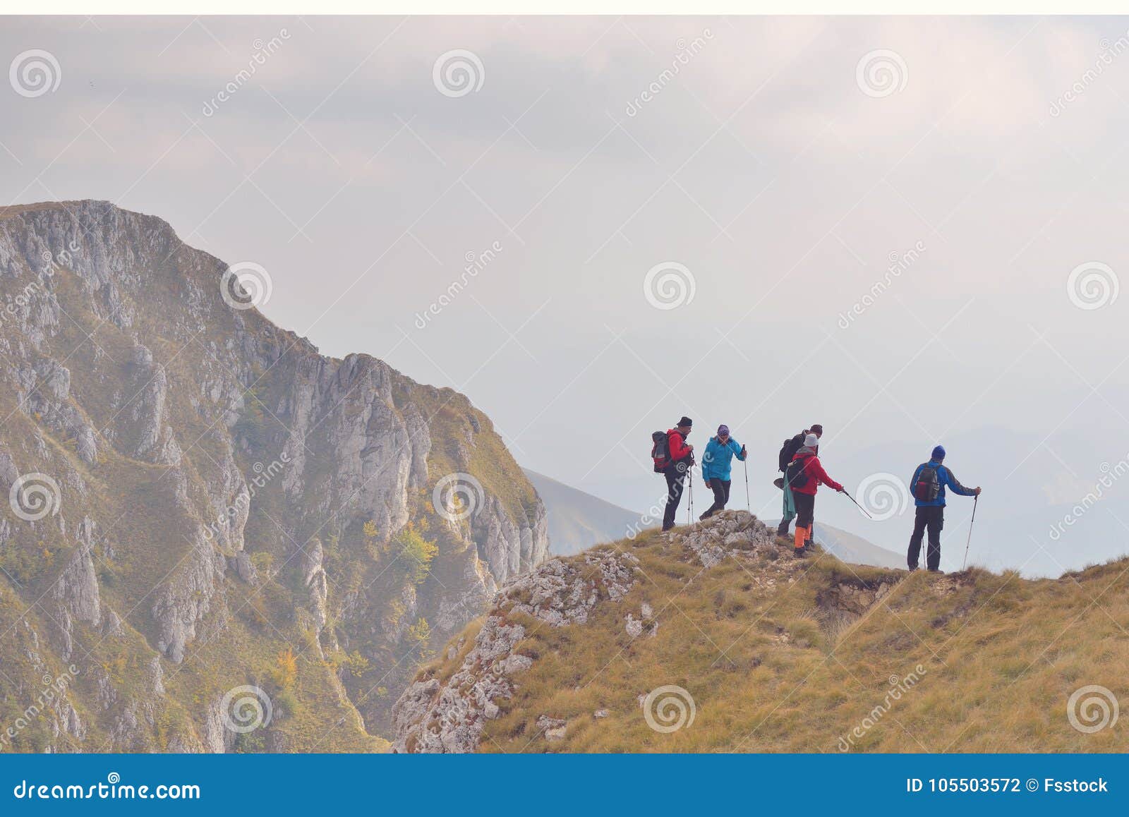 Group of People of Different Age and Ethnicity Walking Up on Mountain ...