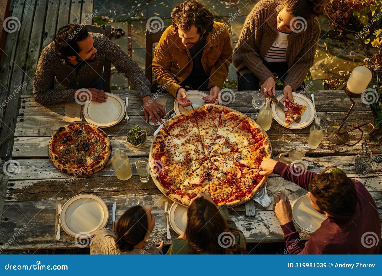 A Group of People from Different Backgrounds Sitting Around a Table ...