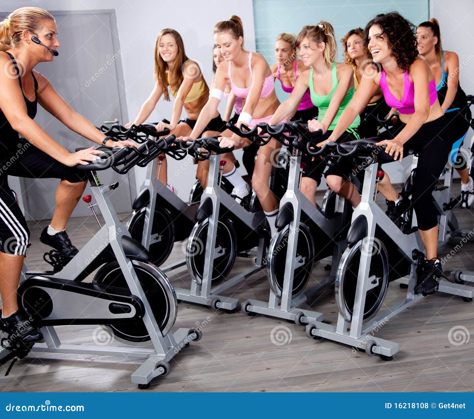 Group of People Doing Exercise on a Bike Stock Photo - Image of care ...