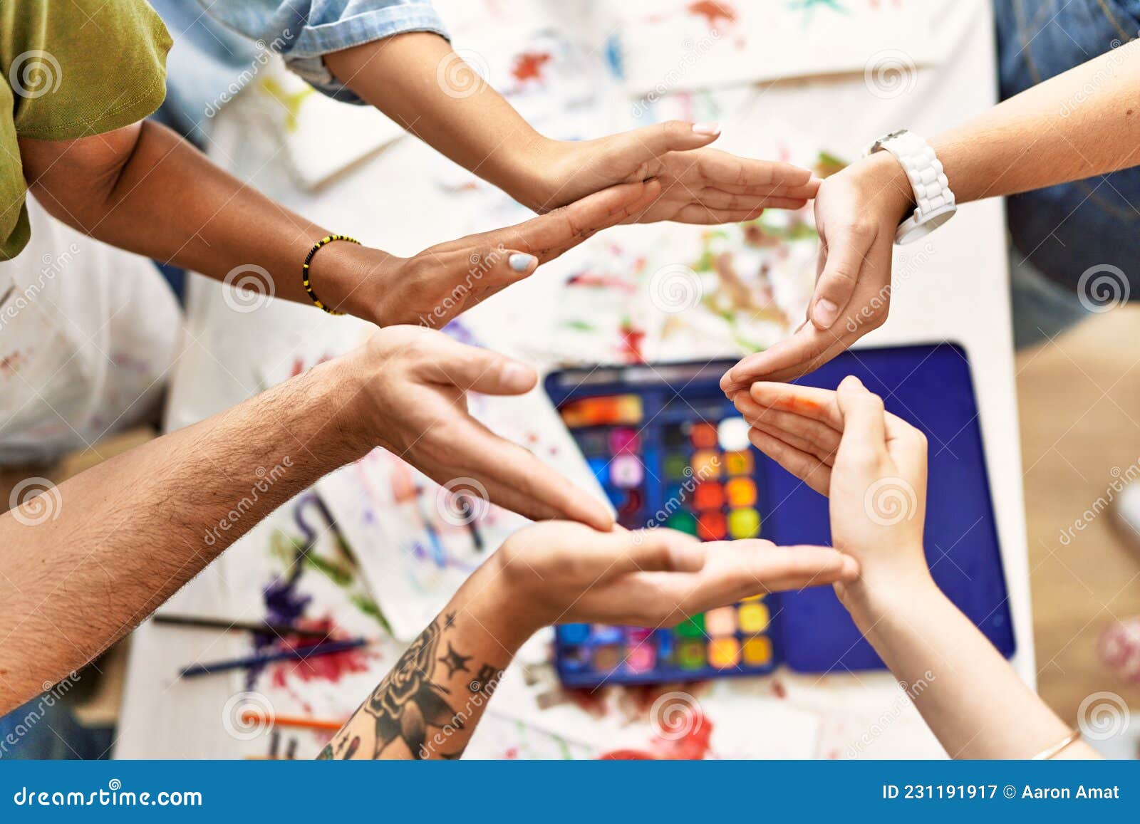 Group of People Doing Heart Sign with Hands Together at Art Studio ...