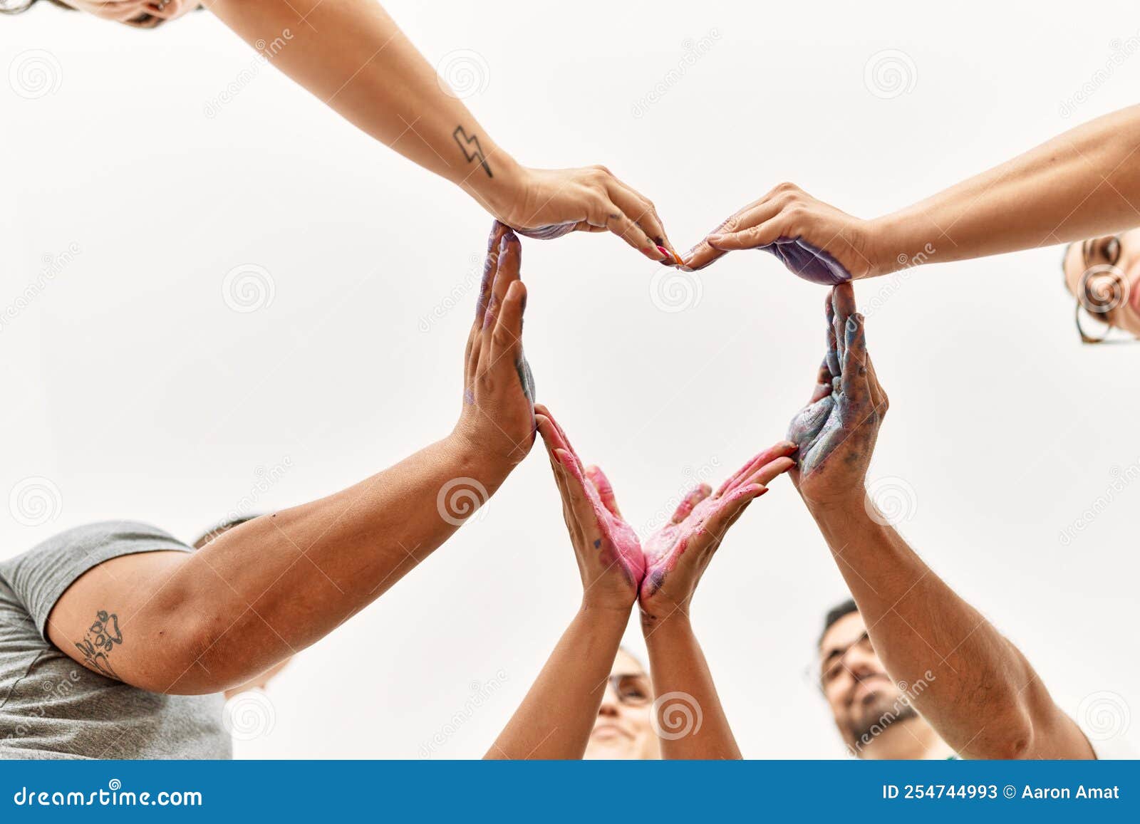 Group of People Doing Heart Sign with Hands Together at Art Studio ...