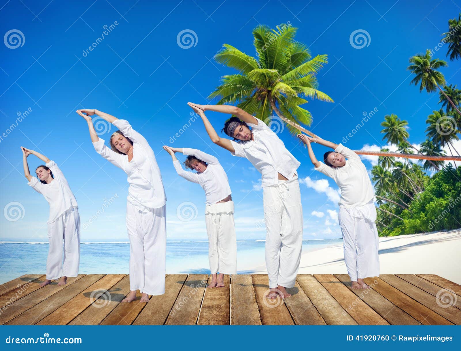 Group of People Doing Yoga on Beach Stock Photo - Image of arms ...