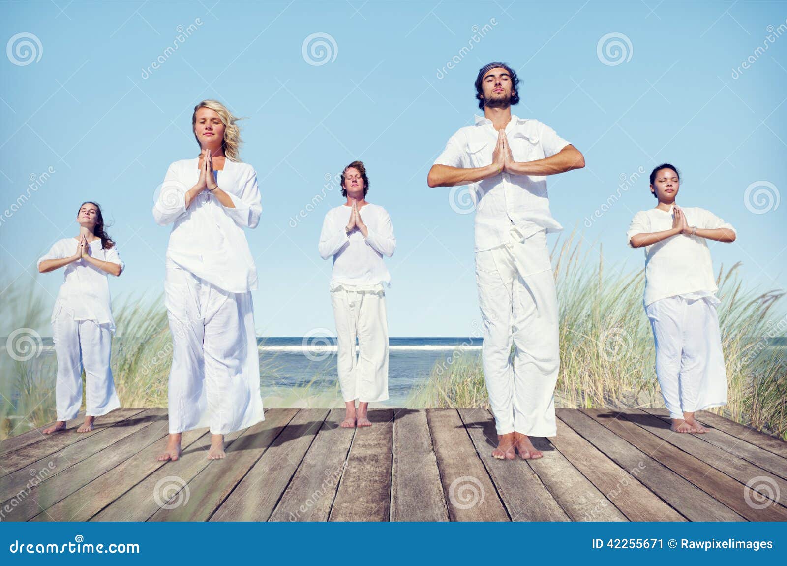 Group of People Doing Yoga on Beach Stock Image - Image of sand ...