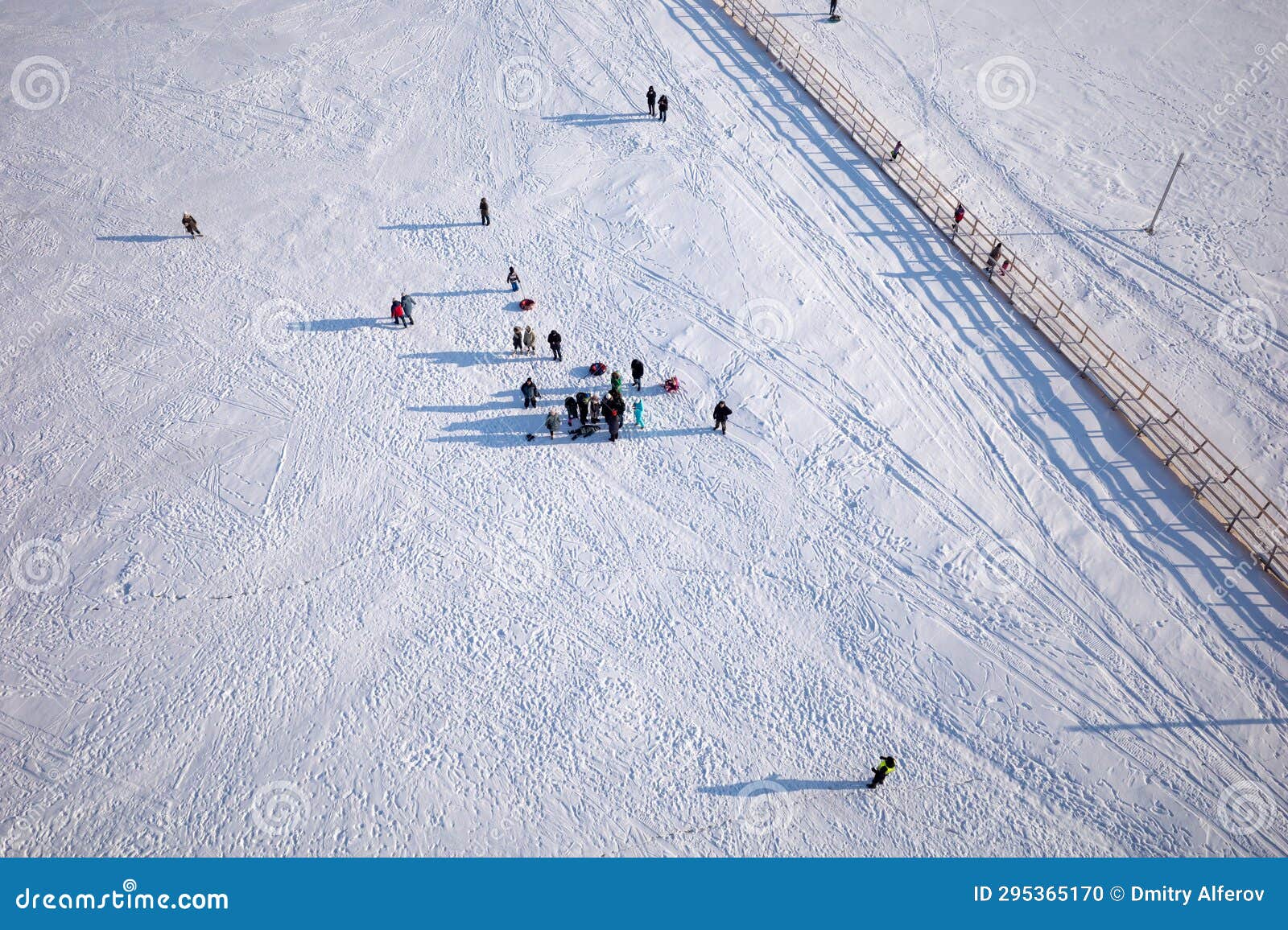 A Group of People Down in the Snow in an Open Space Bird S-eye View ...