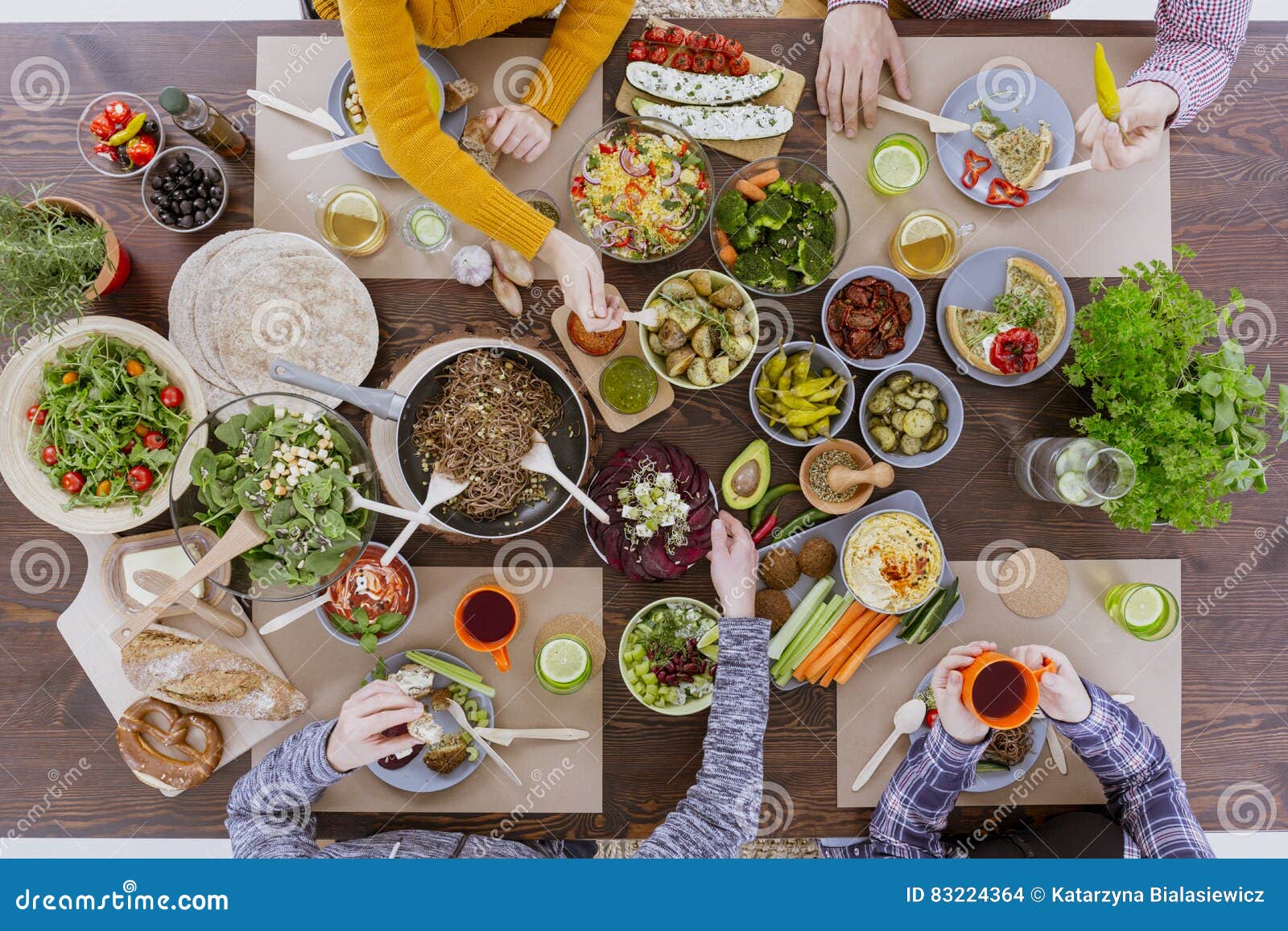 Group of People Eating Dinner Stock Photo - Image of rustic, falafel ...