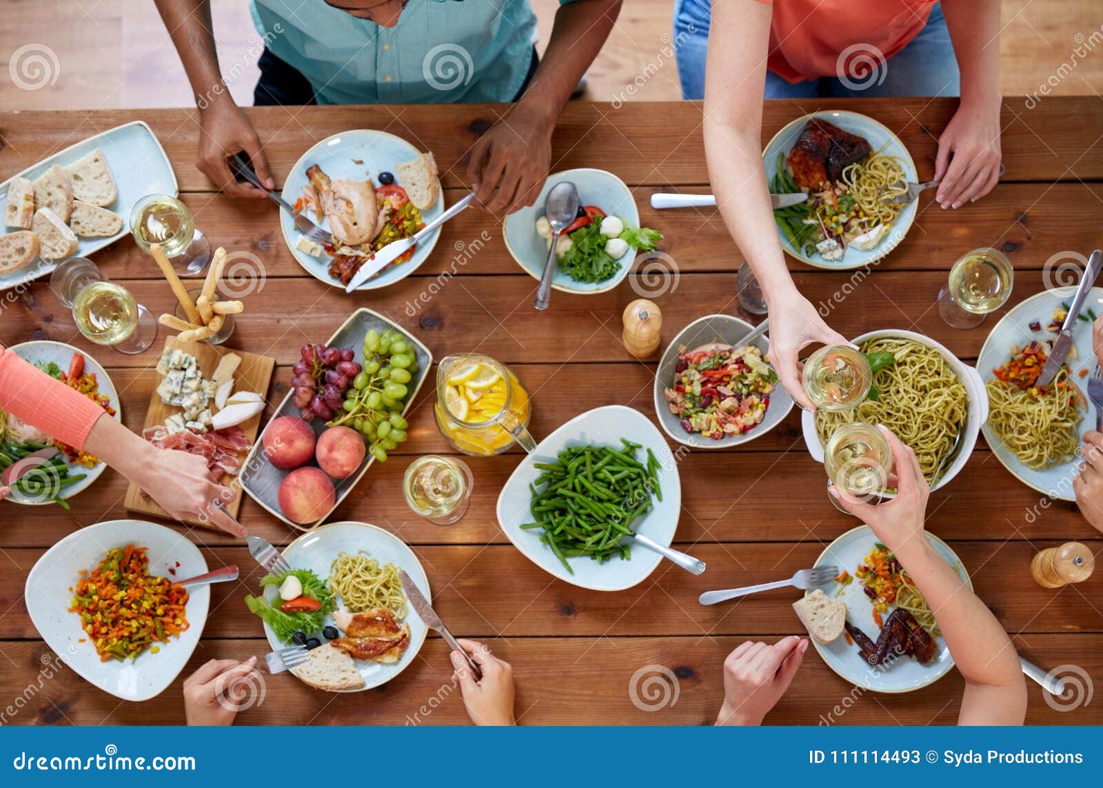 Group of People Eating at Table with Food Stock Image - Image of eating ...