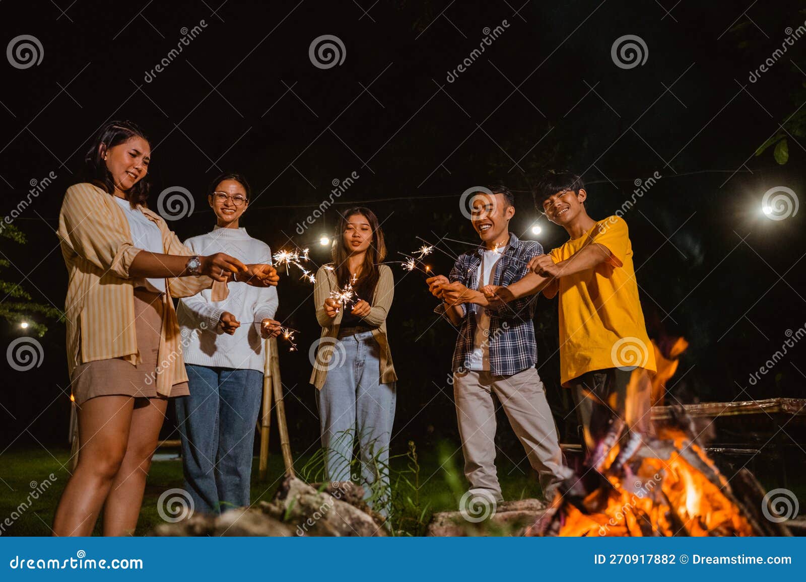 A Group of People so Excited while Playing with the Fireworks Stock ...