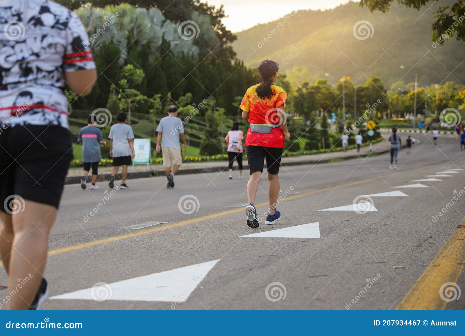 Group of People Exercise Walking in the Park in Morning Editorial ...