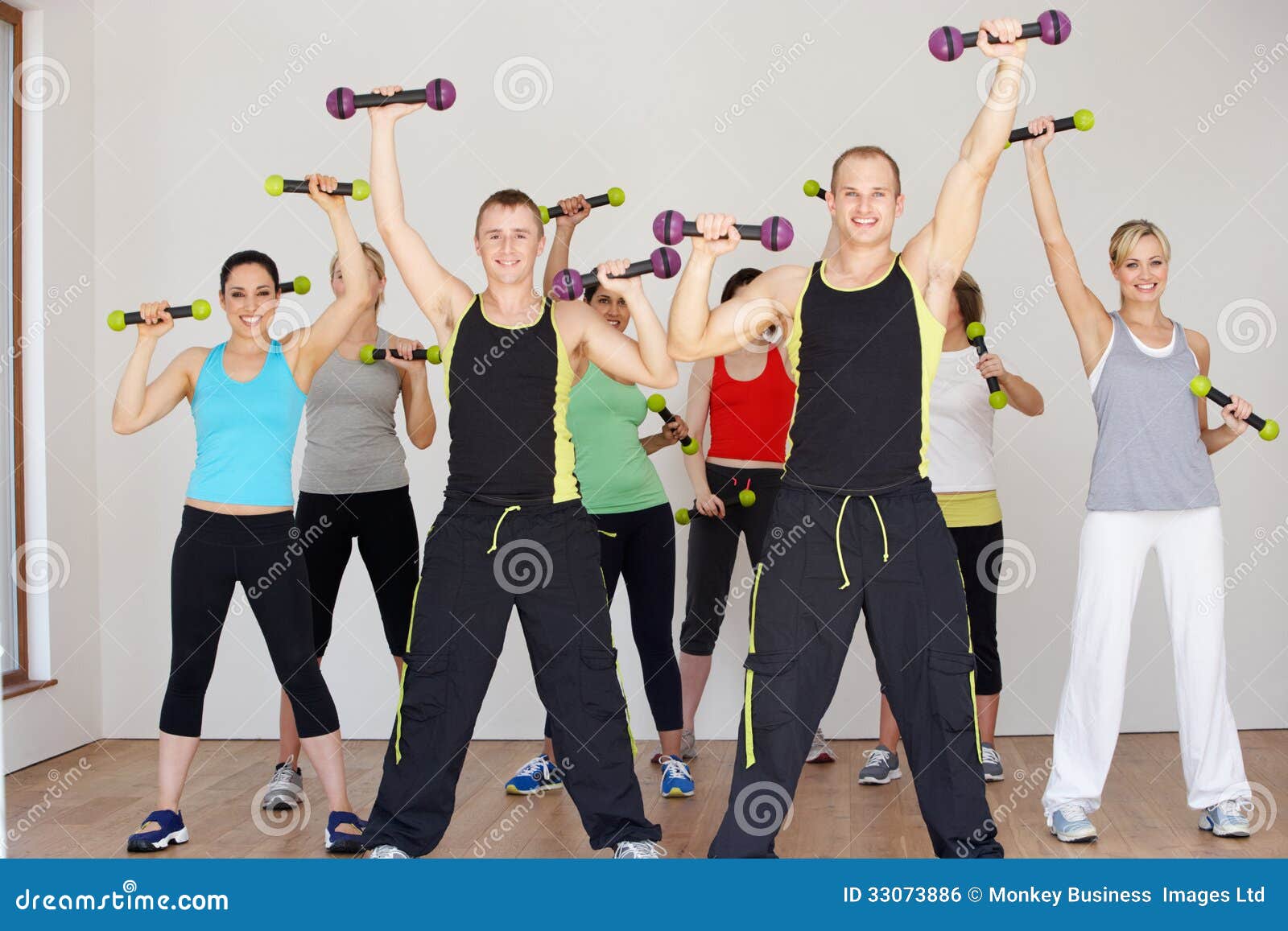 Group of People Exercising in Dance Studio with Weights Stock Photo ...