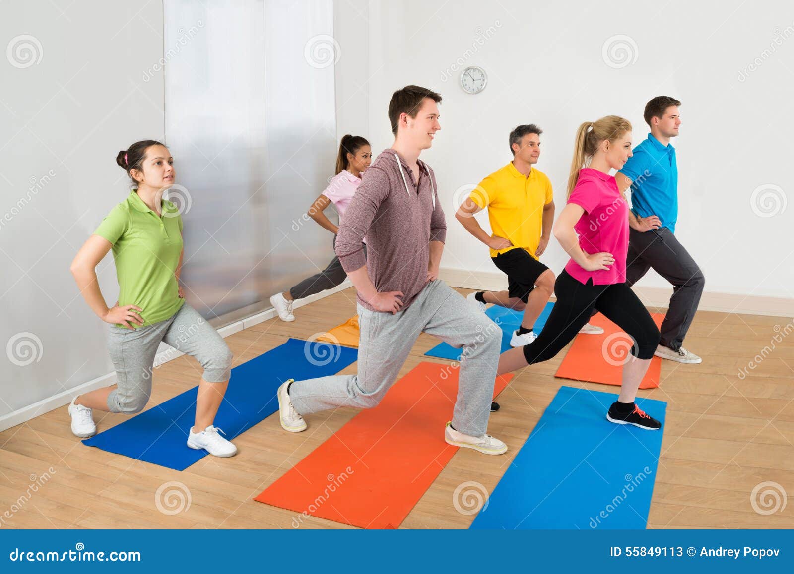 Group of People Exercising on Mat Stock Image - Image of group, aerobic ...