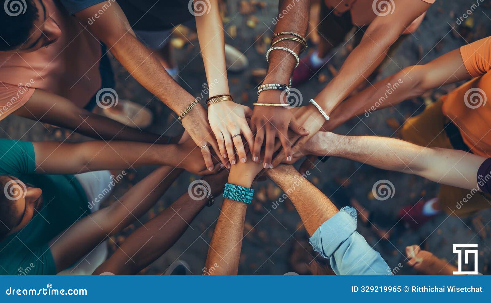 Group of People Forming a Circle, Each Placing a Hand in the Center ...