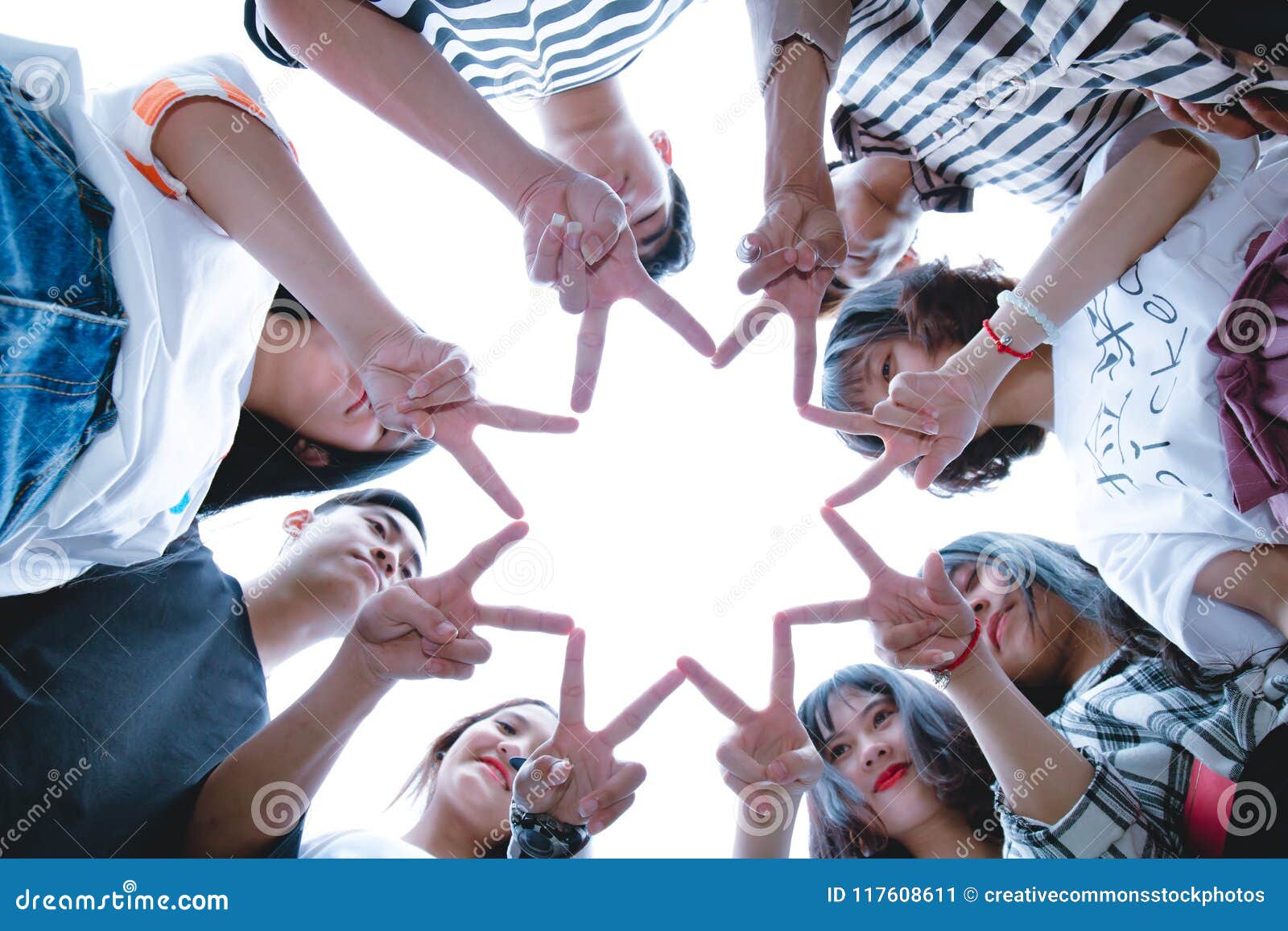 Group Of People Forming Star Using Their Hands Picture. Image: 117608611
