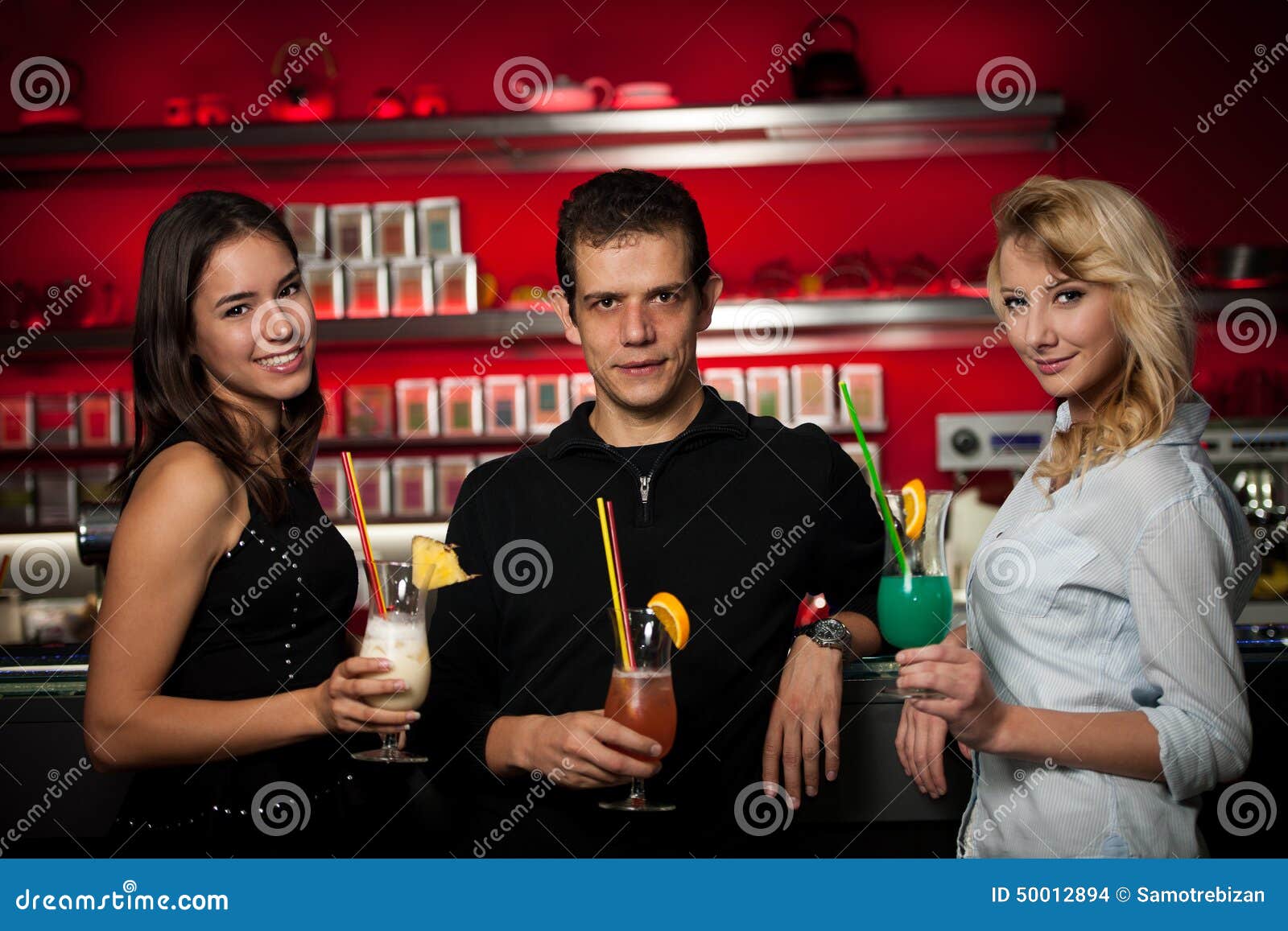 Group of People Gathering in Cocktail Bar and Having Fun Stock Photo ...